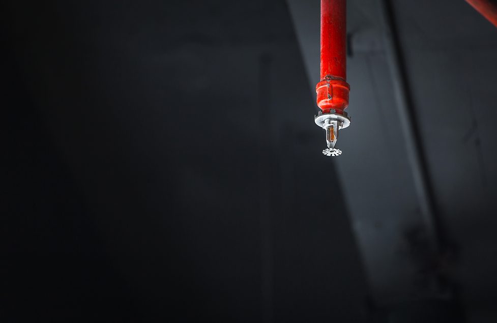 The Great Debate: Can Sprinklers be Omitted from Certain Building Features? | phcppros